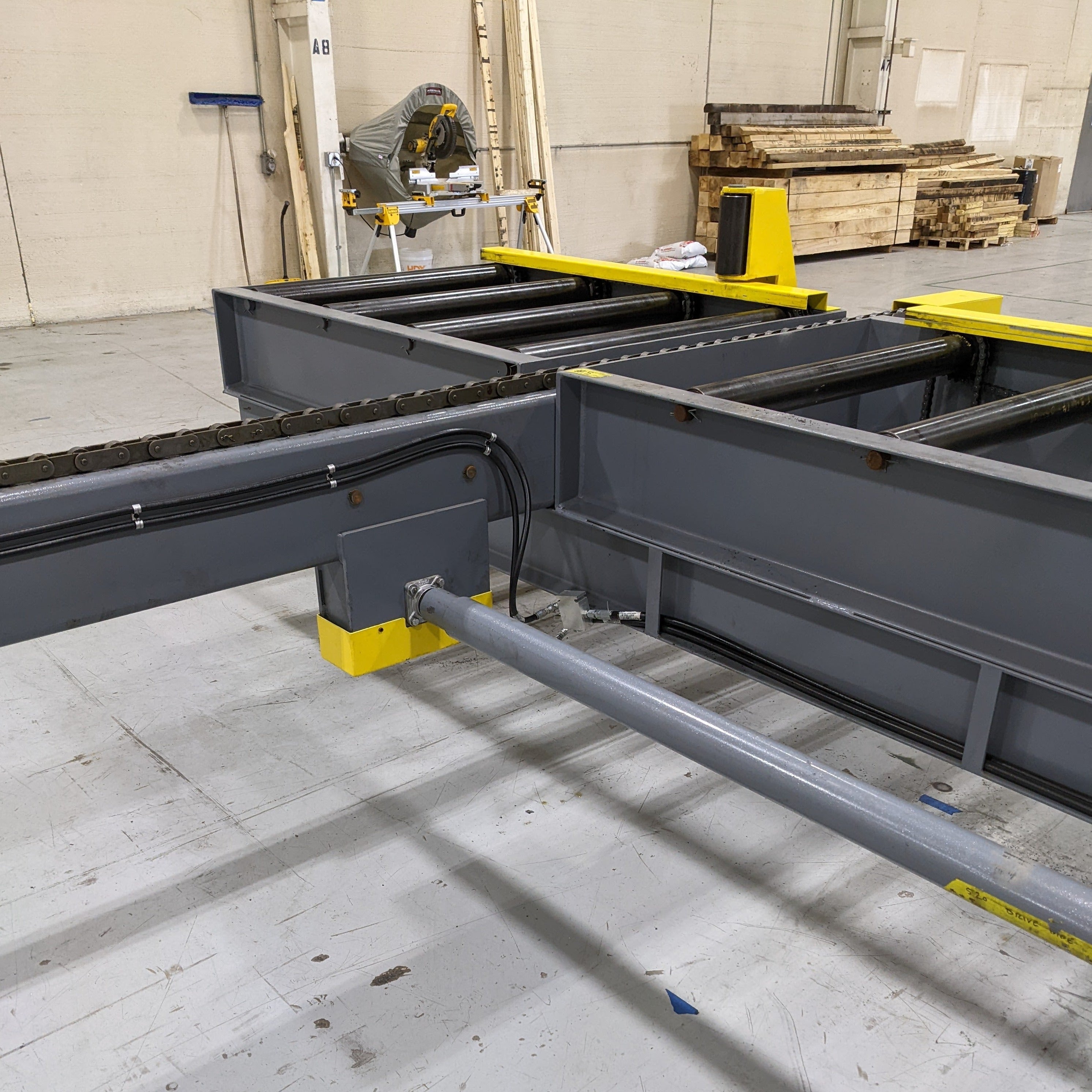 Single Saw system with powered lift transfer arms – Bad Ass Band Saws